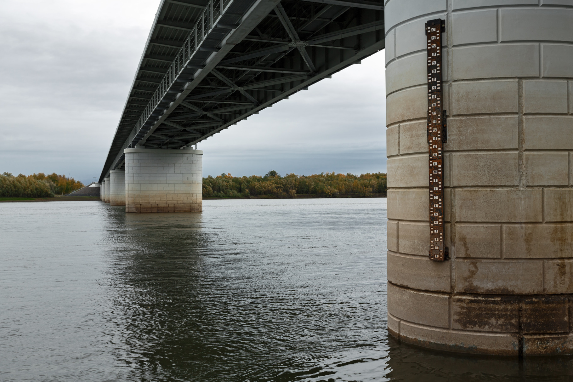 Bottom view of bridge supports, a Photo by Alexander-Piragis