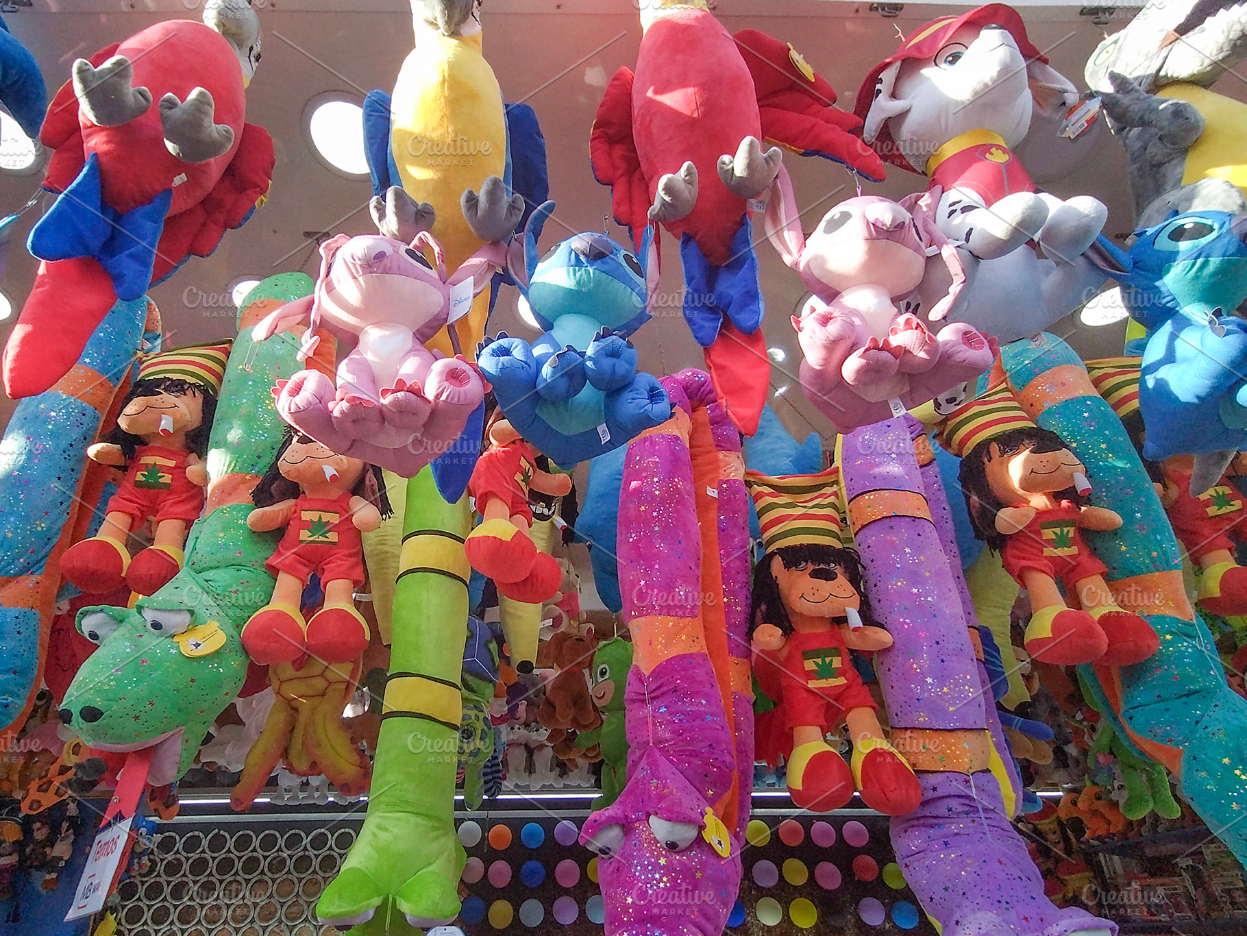 Plush toy booth at fair with bright characters, an Arts & Entertainment ...