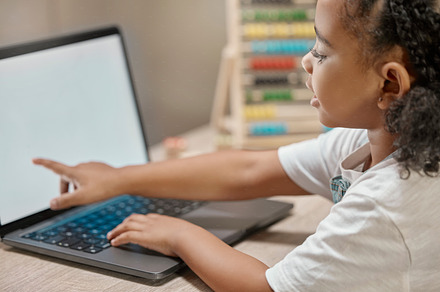 Student with smartwatch using tablet in library, a Photo by wavebreak