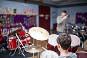 Drum class in a music school featuring fun, kid, and boy, a School ...